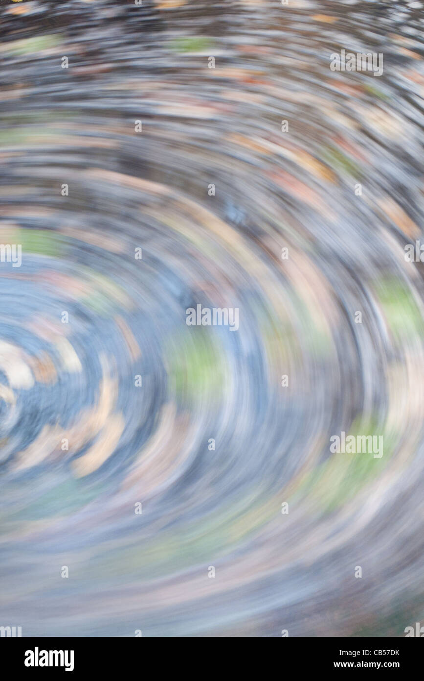 Eddy of water and leaves Stock Photo - Alamy