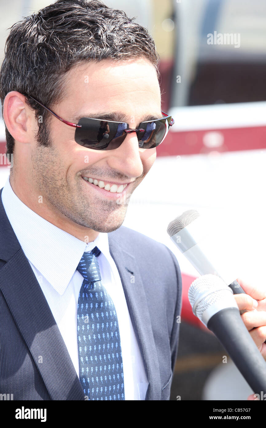Man talking to the press Stock Photo - Alamy