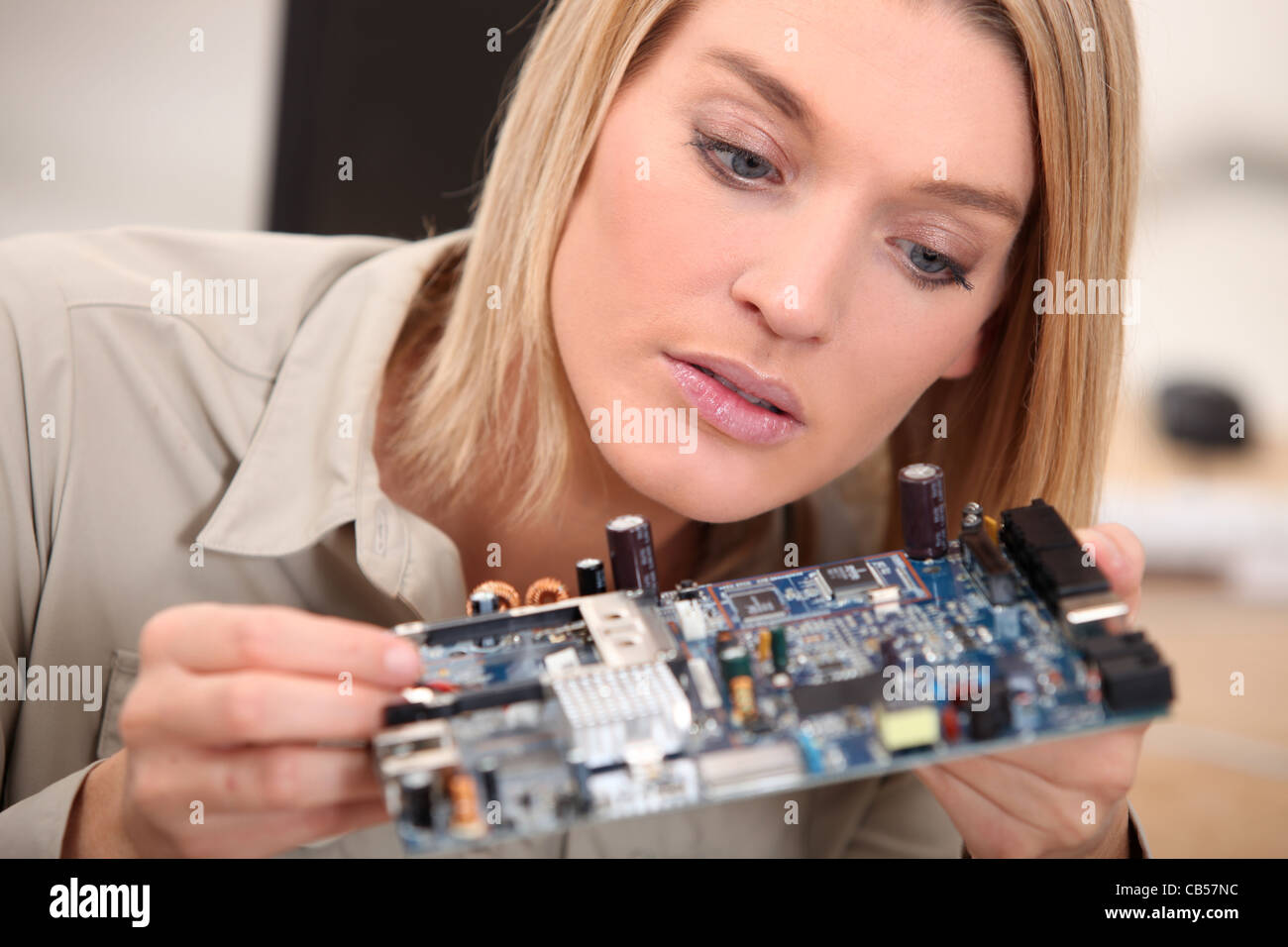 woman repairing pc Stock Photo - Alamy