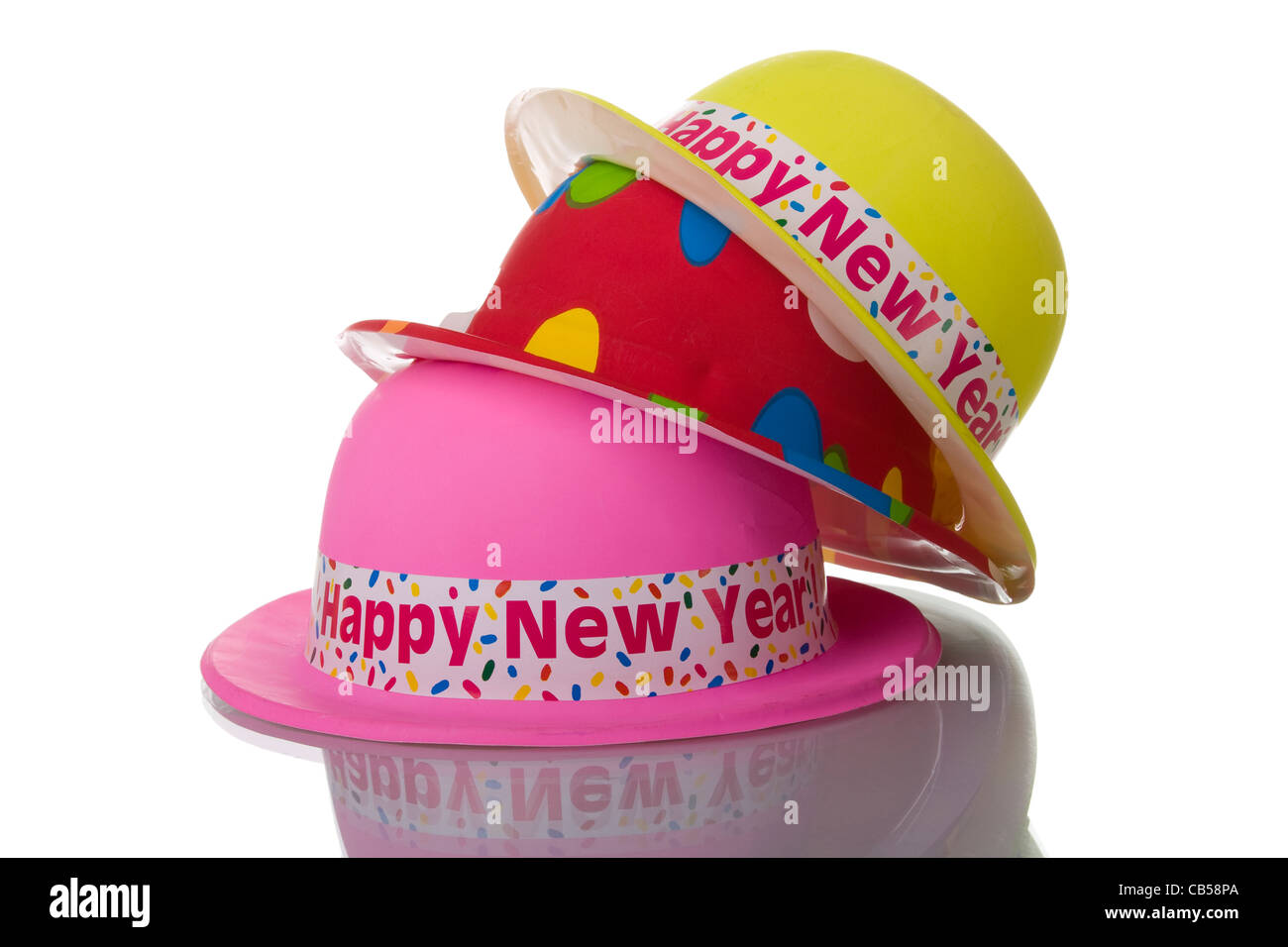 a colorful new year hats (isolated on white Stock Photo - Alamy