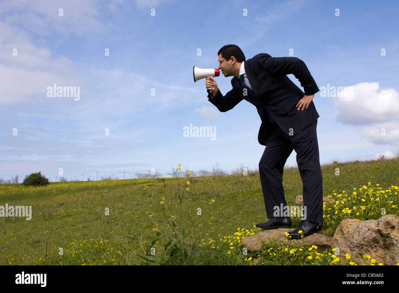 Speaking into a megaphone hi-res stock photography and images - Alamy