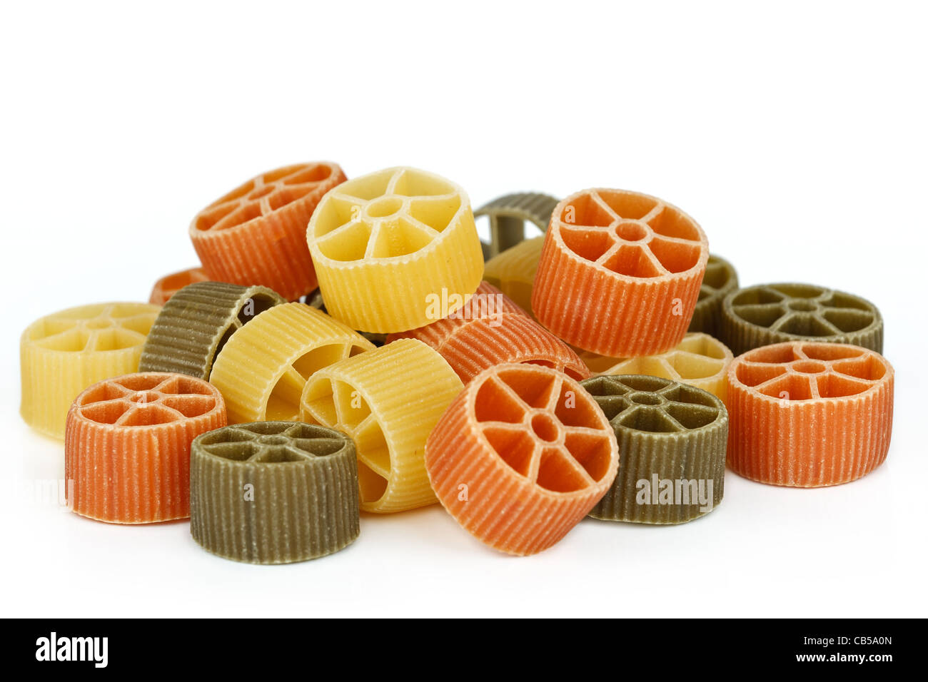 Colorful dry pasta on white background Stock Photo - Alamy