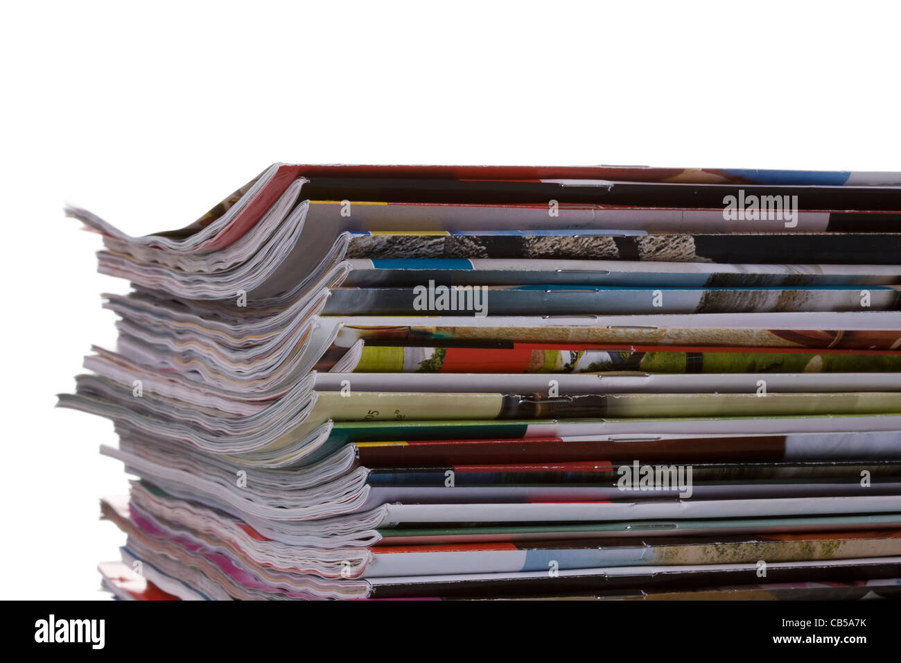 Stack of magazines isolated on white with reflection Stock Photo - Alamy