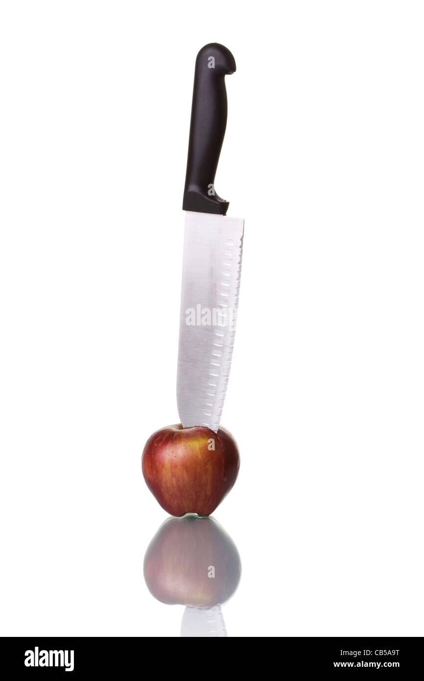 Knife cutting an apple isolated on white with reflection Stock Photo ...