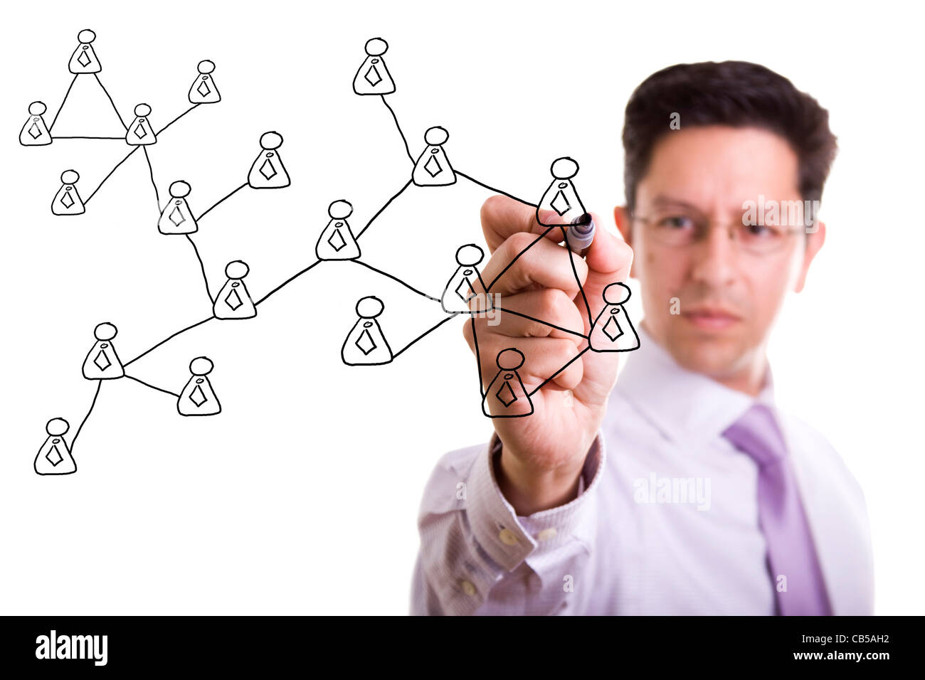 businessman drawing a social network scheme on a whiteboard (selective ...