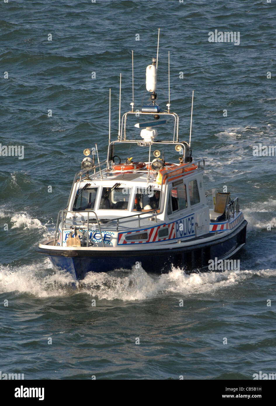 A police launch on maritime patrol duties protecting ports and harbours ...