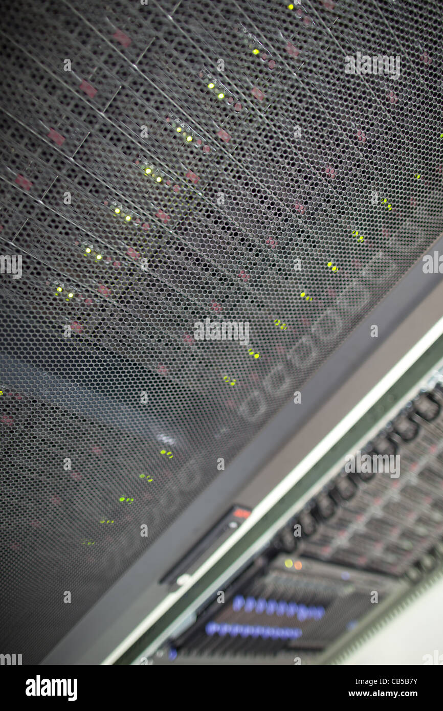 Server rack cluster in a data center (shallow DOF; color toned image ...