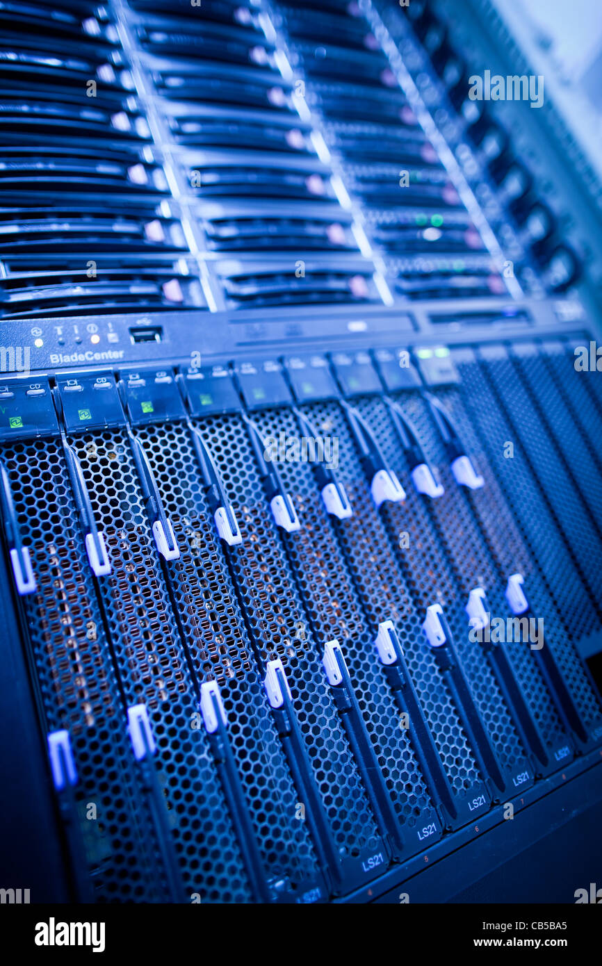 Server rack cluster in a data center (shallow DOF; color toned image ...