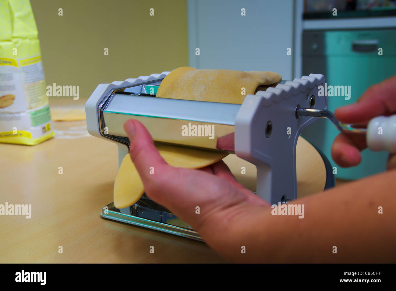 Making fresh pasta - flour and eggs - rolling Stock Photo - Alamy