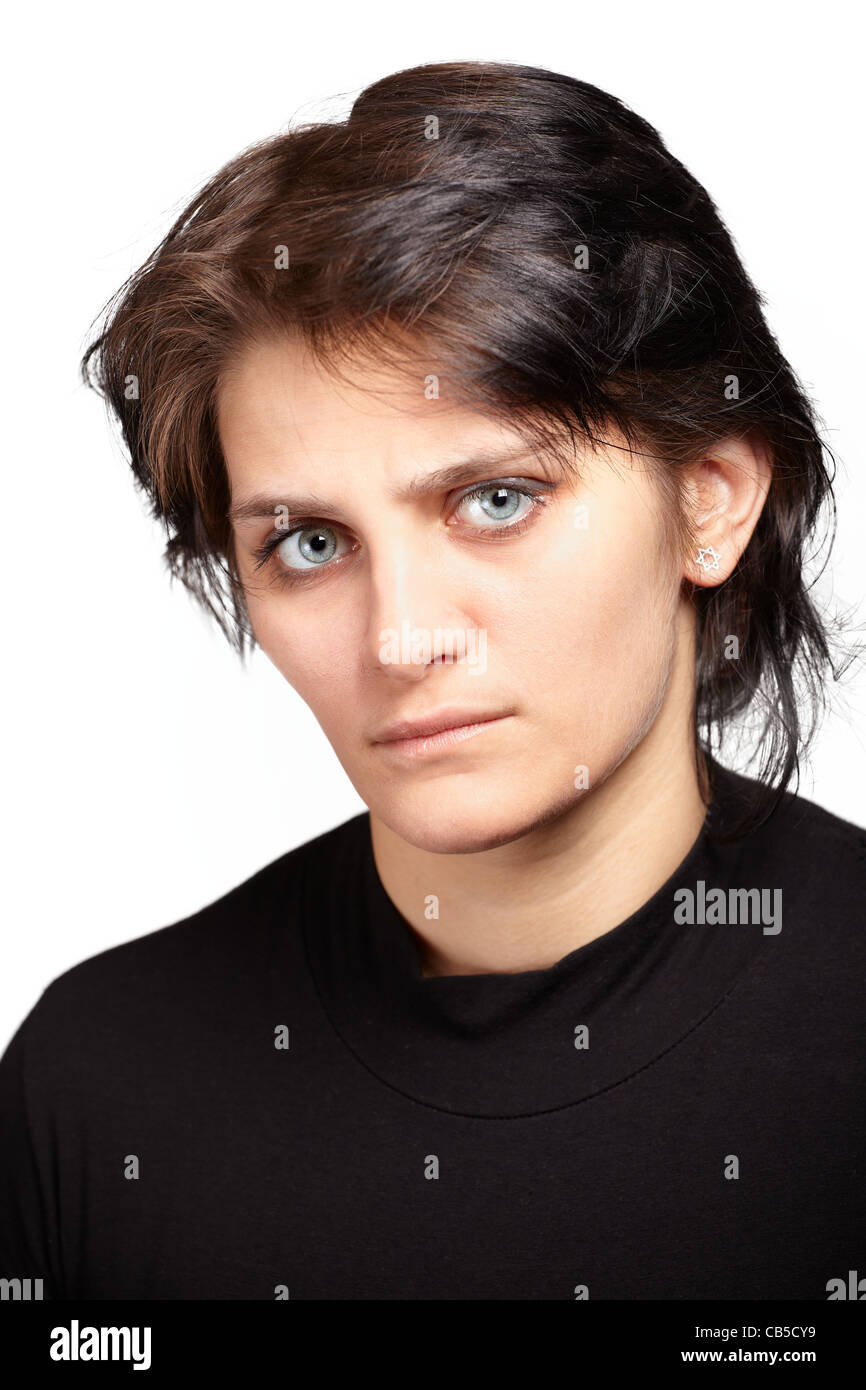Portrait of an angry young woman looking at camera Stock Photo - Alamy