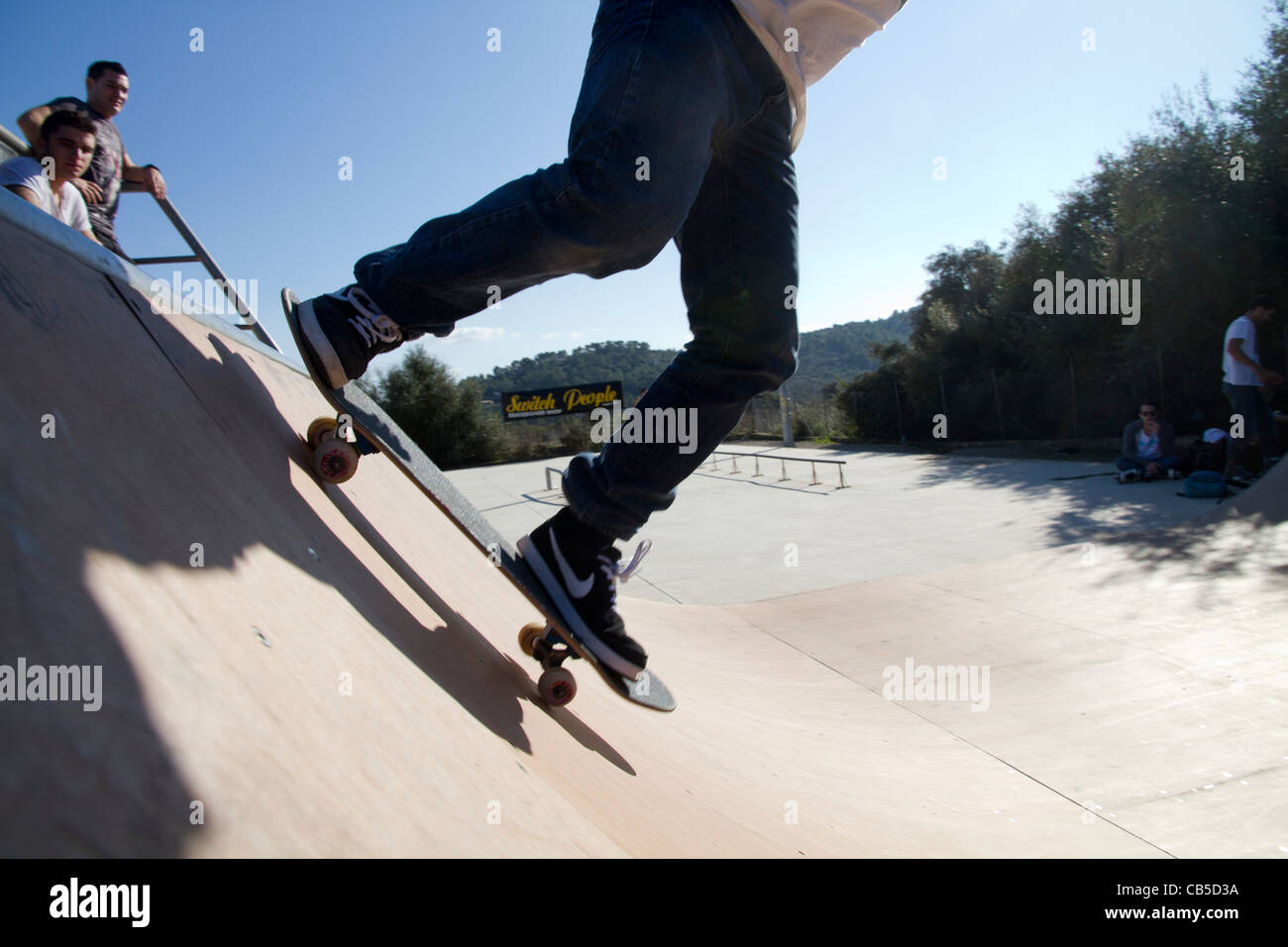 person on skateboard skateboarding on vert in action sport Stock Photo ...