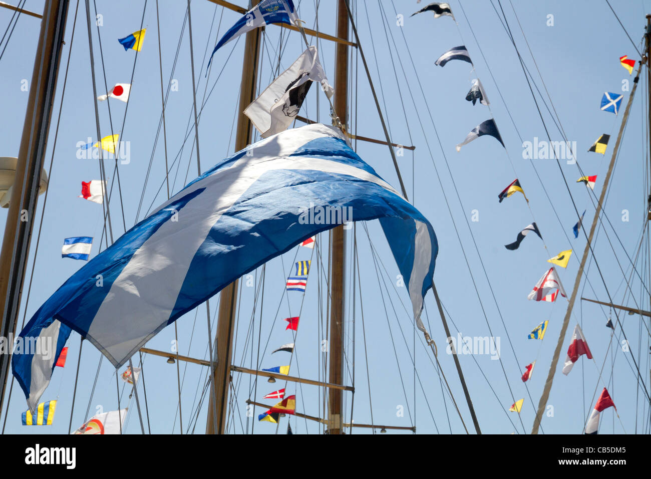 group of flags on sky Classic yacht sailboat Stock Photo - Alamy