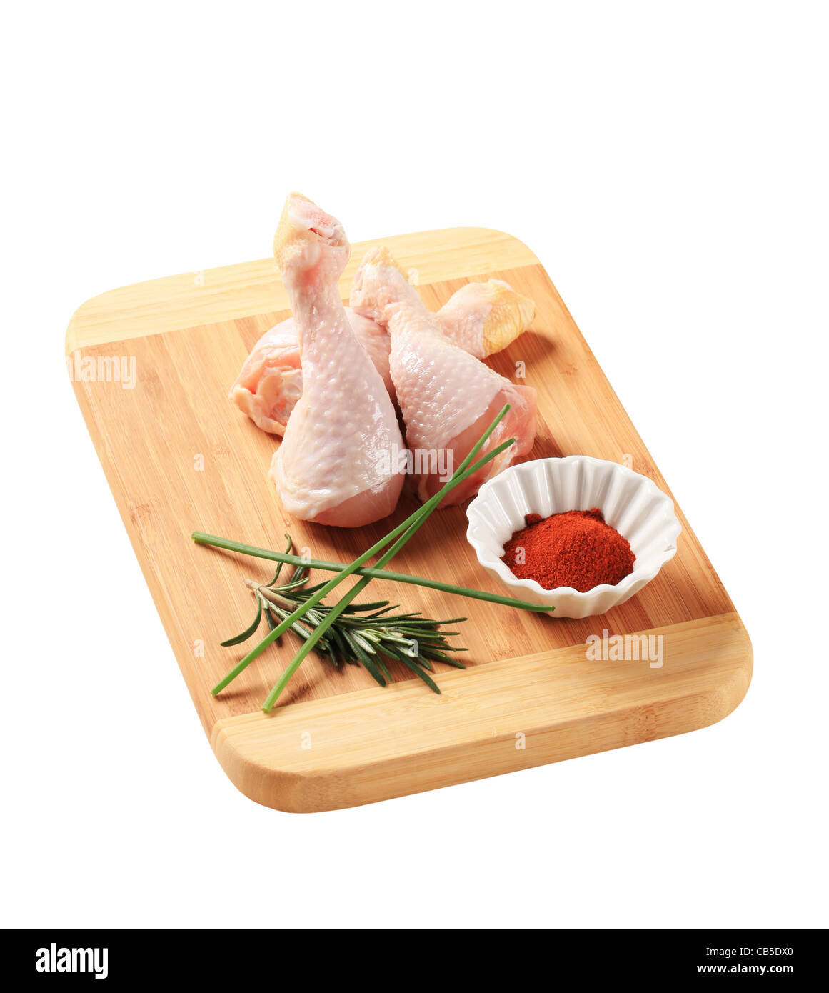 Raw chicken seasoning Cut Out Stock Images & Pictures - Alamy