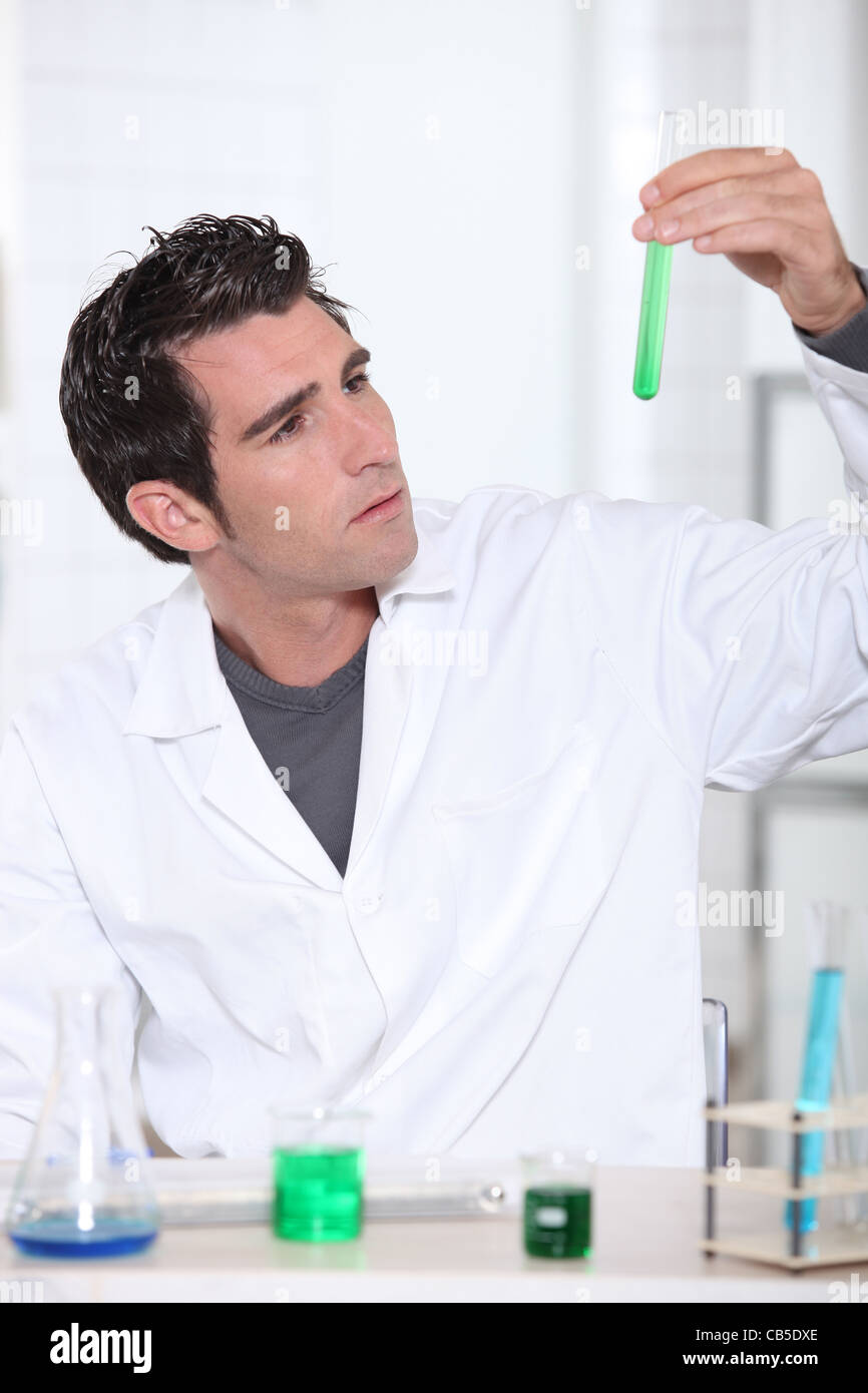 Scientist with test tube rack Stock Photo - Alamy