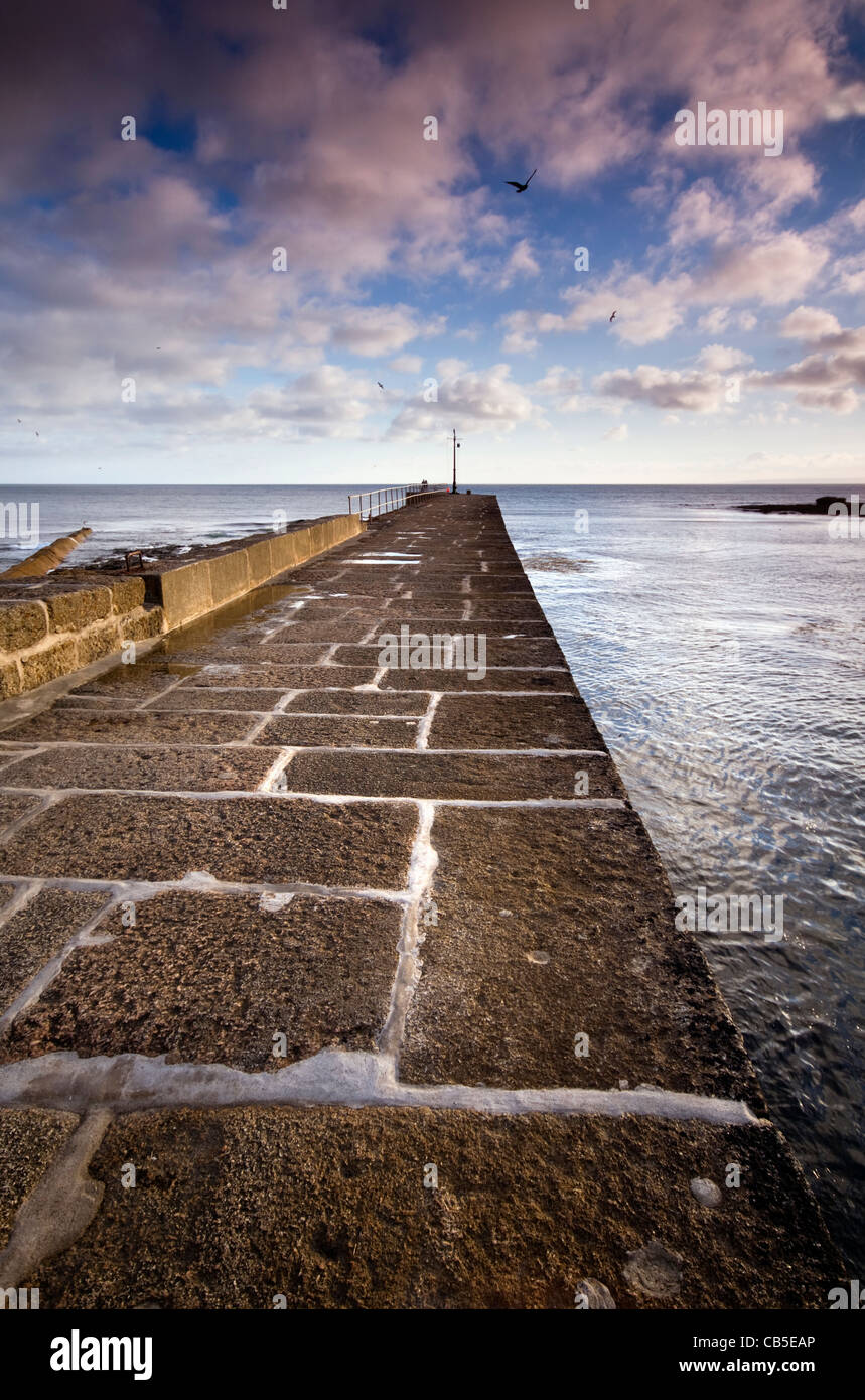 The stone jetty at Porthleven harbour in Cornwall, England Stock Photo ...