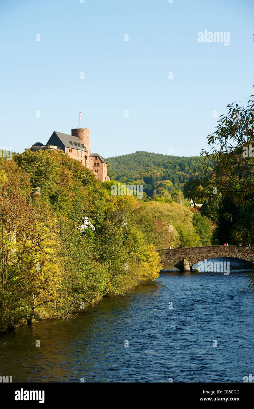 River Rur in Heimbach with stone bridge and the Hengenbach castle Stock ...