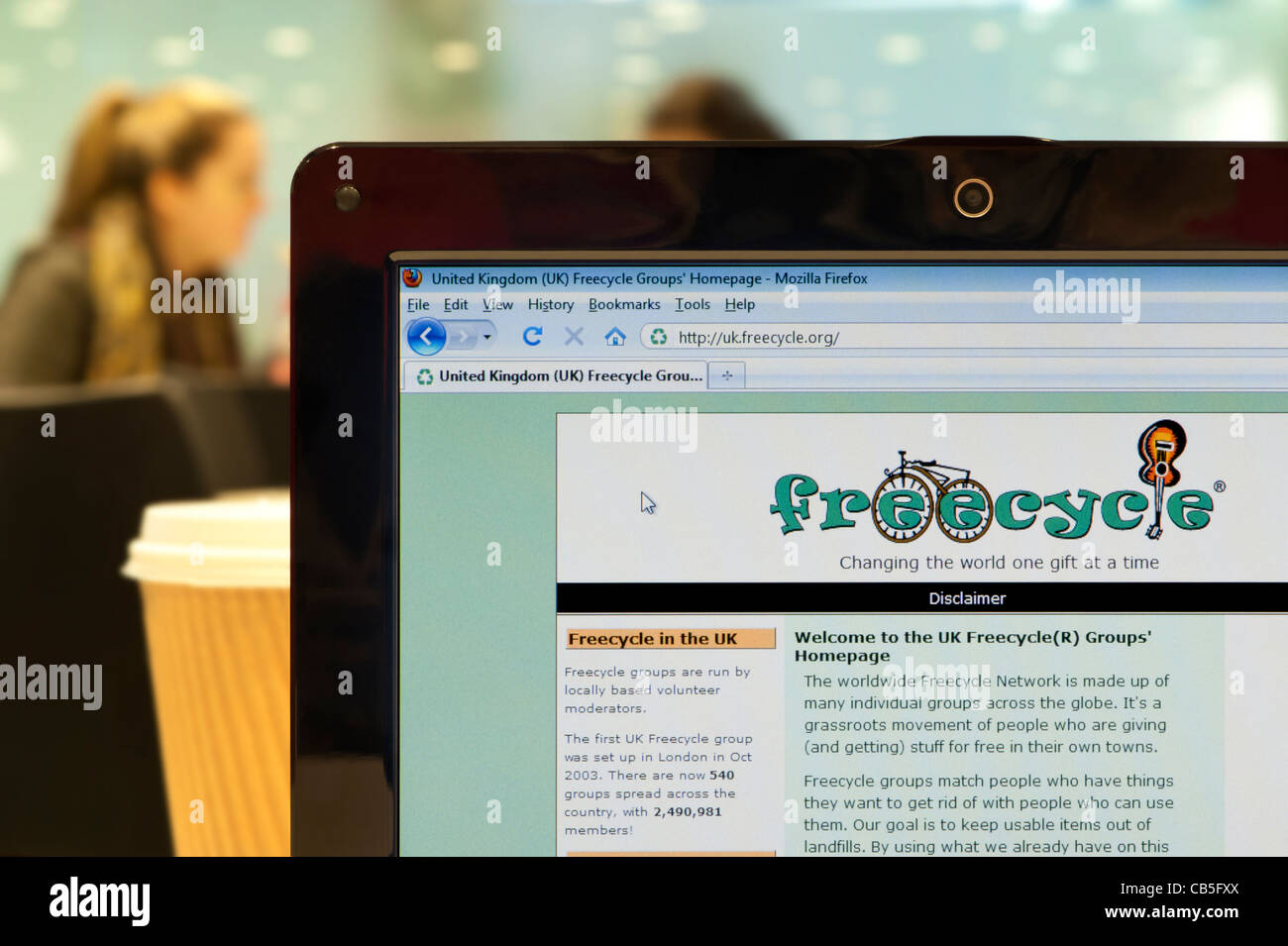 The Freecycle website shot in a coffee shop environment (Editorial use ...