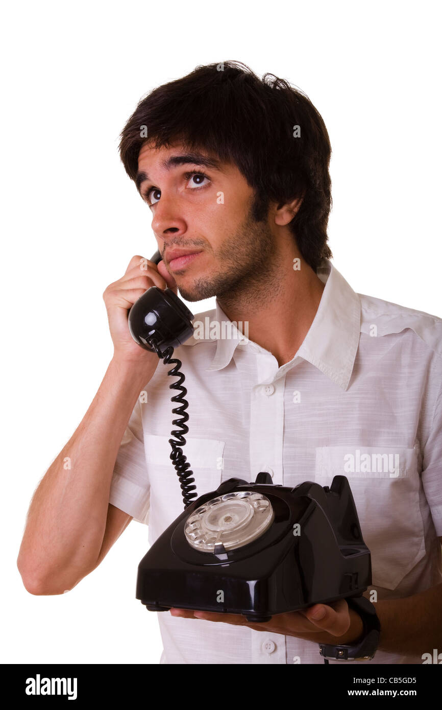 young men talking with a old telephone Stock Photo - Alamy
