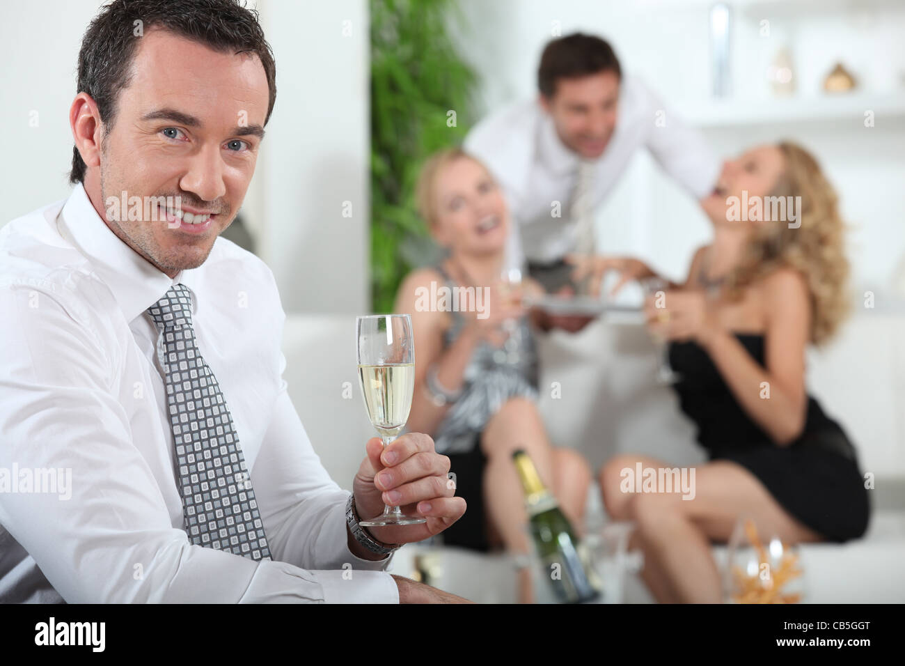 Man drinking champagne Stock Photo - Alamy