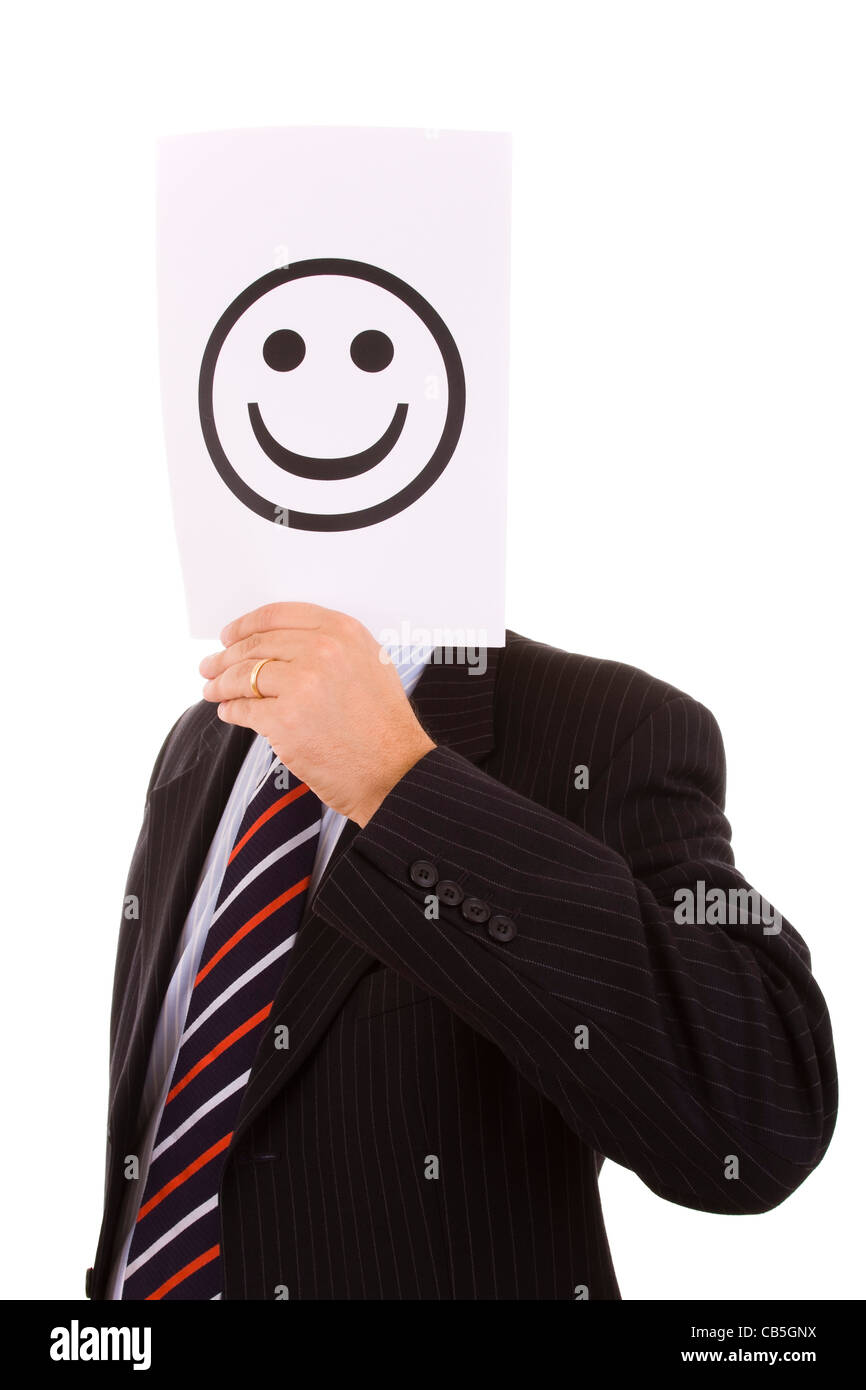 hypocrite businessman hiding behind a big smile symbol Stock Photo - Alamy