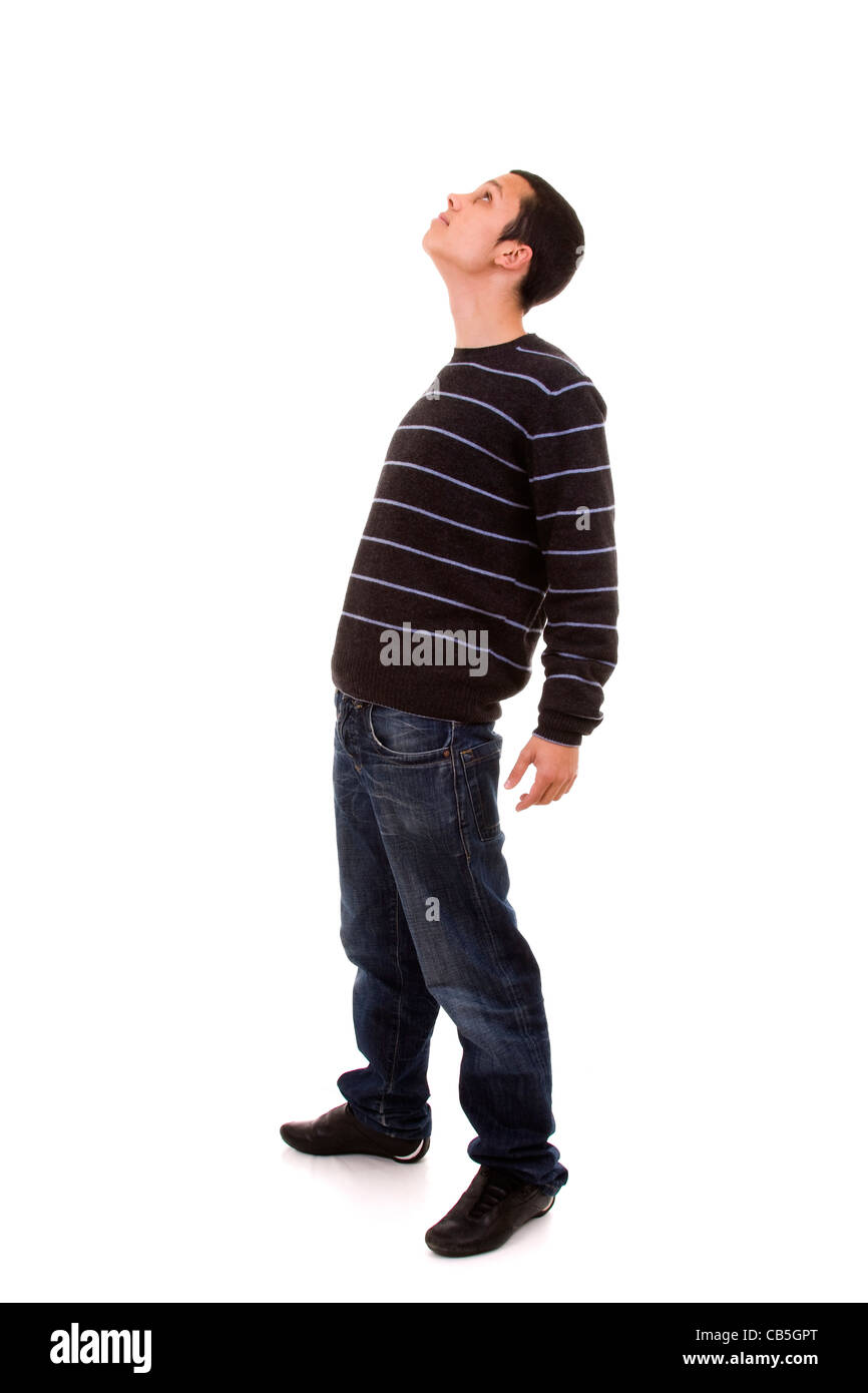 young man standing with his head looking up (isolated on white Stock ...