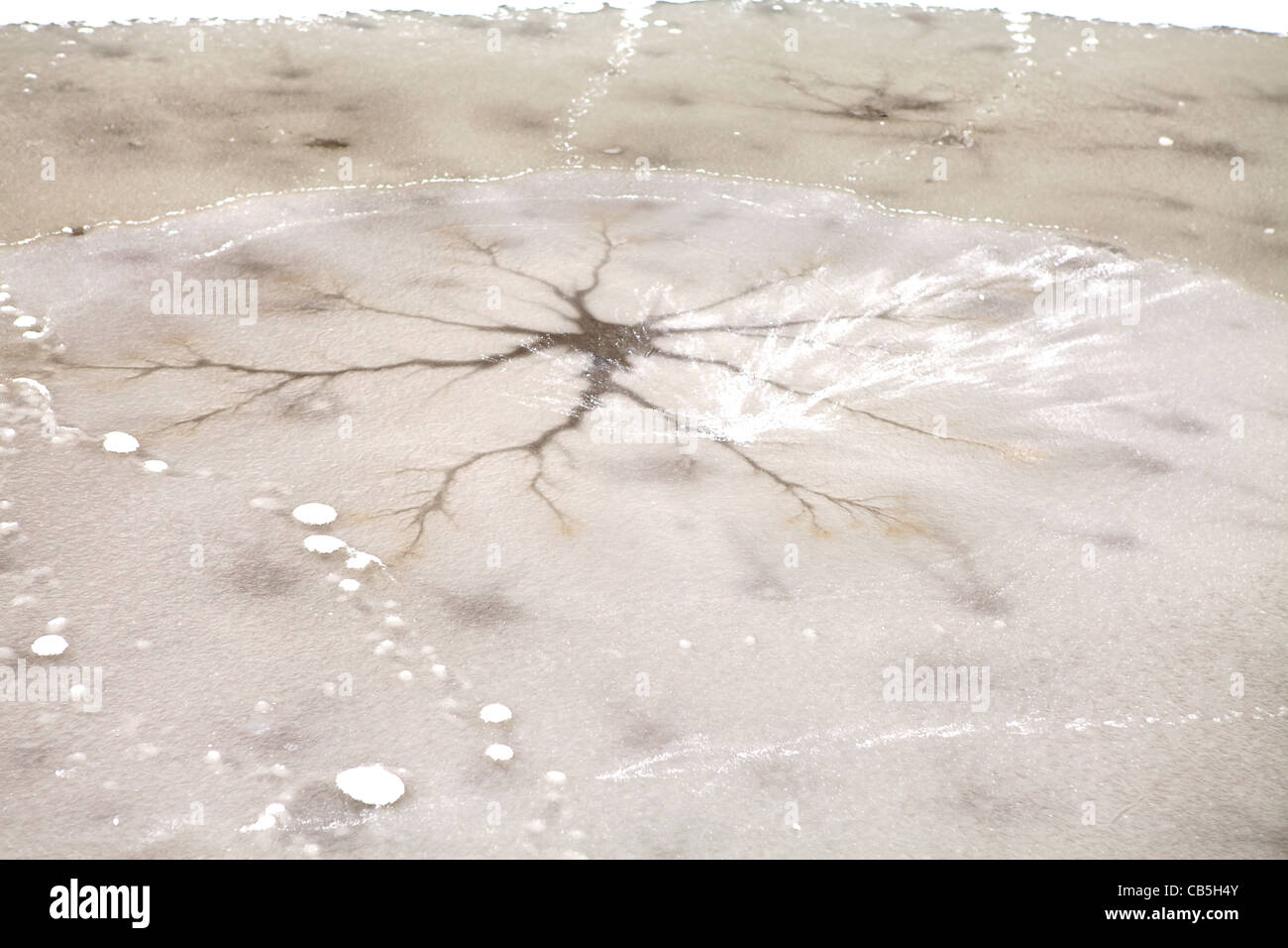Winter hole in ice in closeup Stock Photo - Alamy