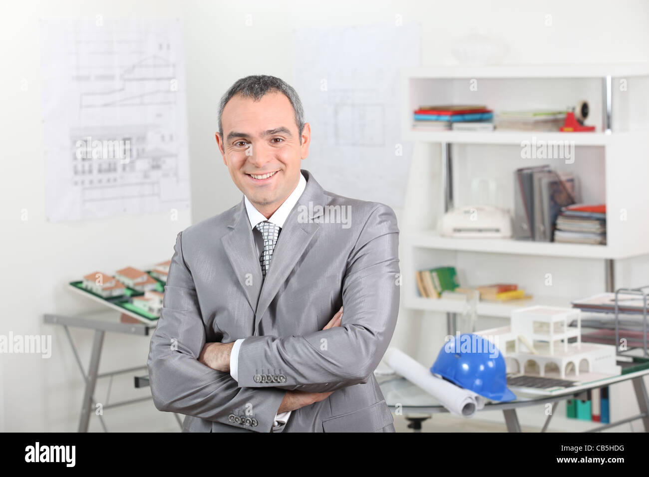 Smiling architect in office Stock Photo - Alamy