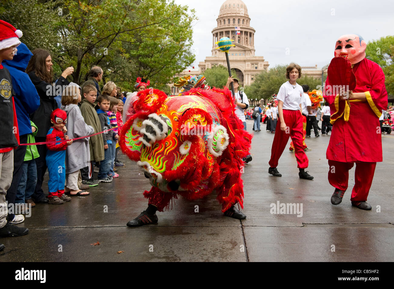 Annual Thanksgiving Day parade in downtown Austin to collect holiday ...