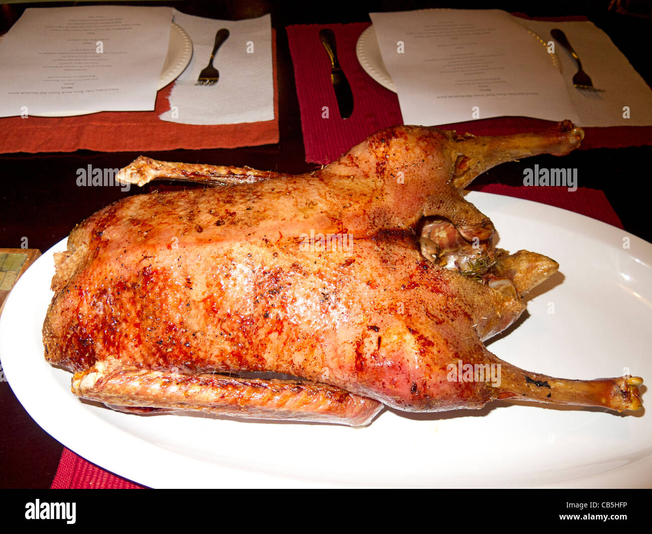 Roasted goose on table hi-res stock photography and images - Alamy