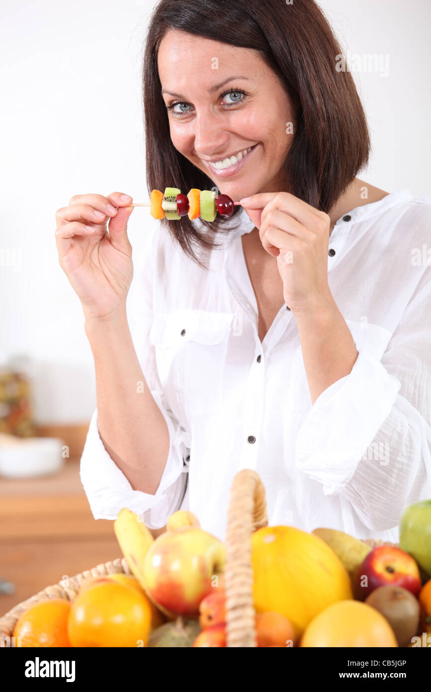 woman eating fruits Stock Photo - Alamy