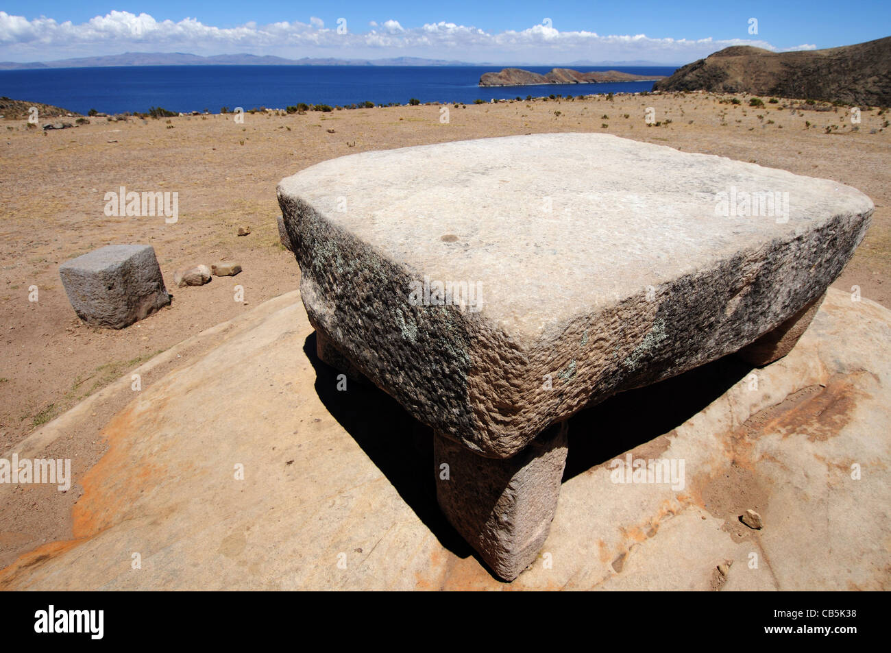 A stone table used for human sacrifice on Isla del Sol in Lake Titicaca ...