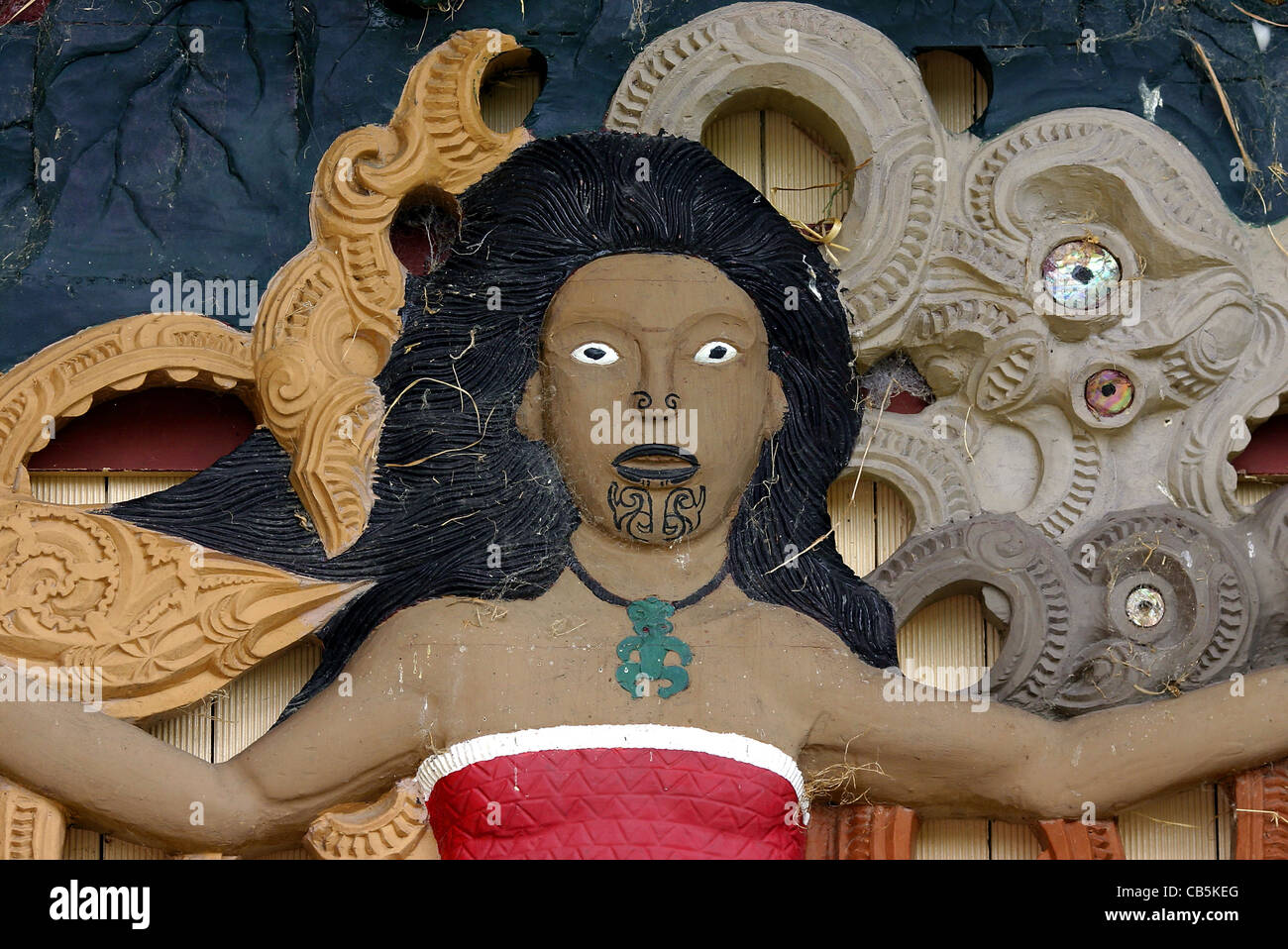 Detail of Maori carving on entrance to Taane Nuia Rangi Marae meeting ...