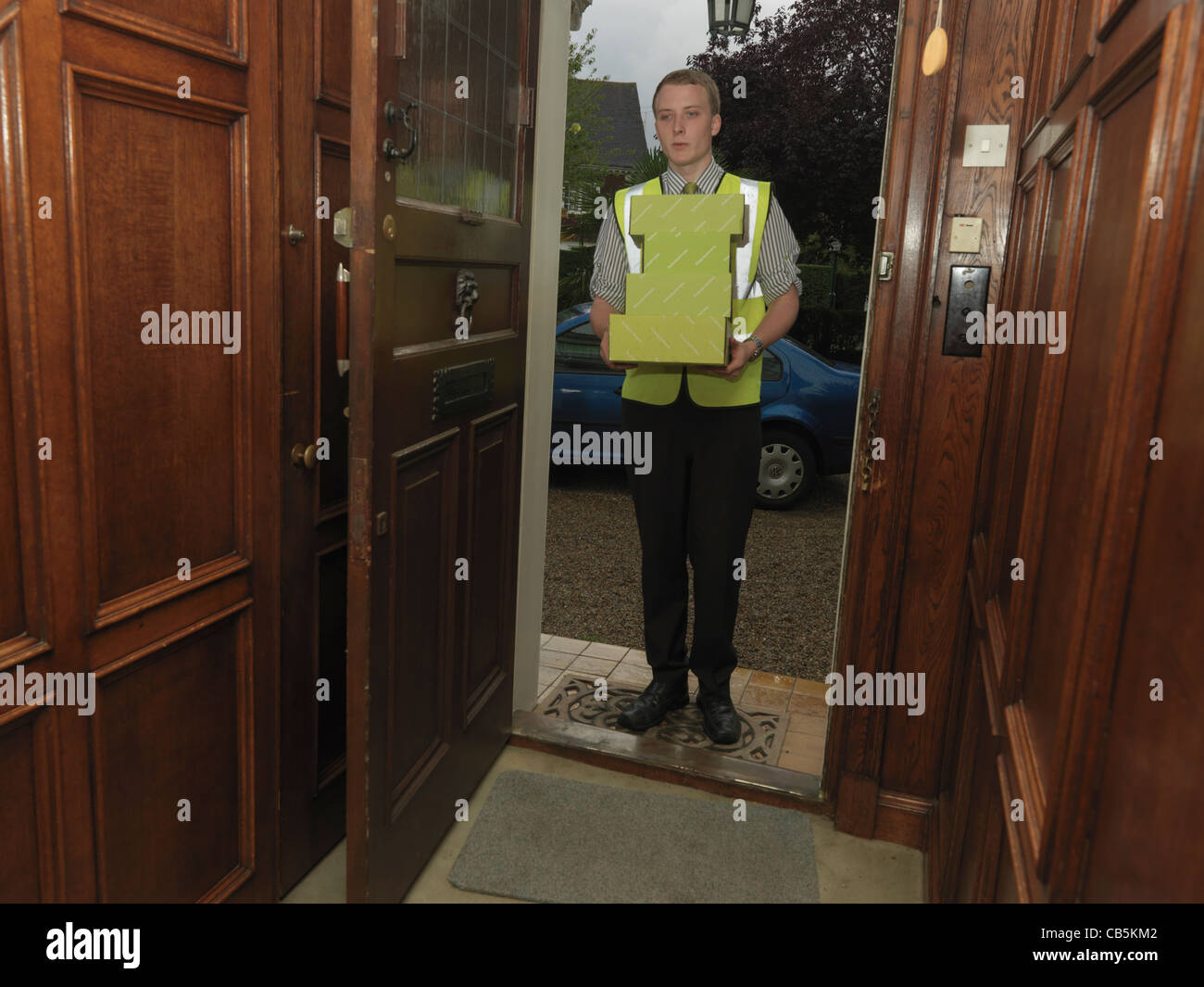 Waitrose Delivery Man Delivering Food For A Party Surrey England Stock ...
