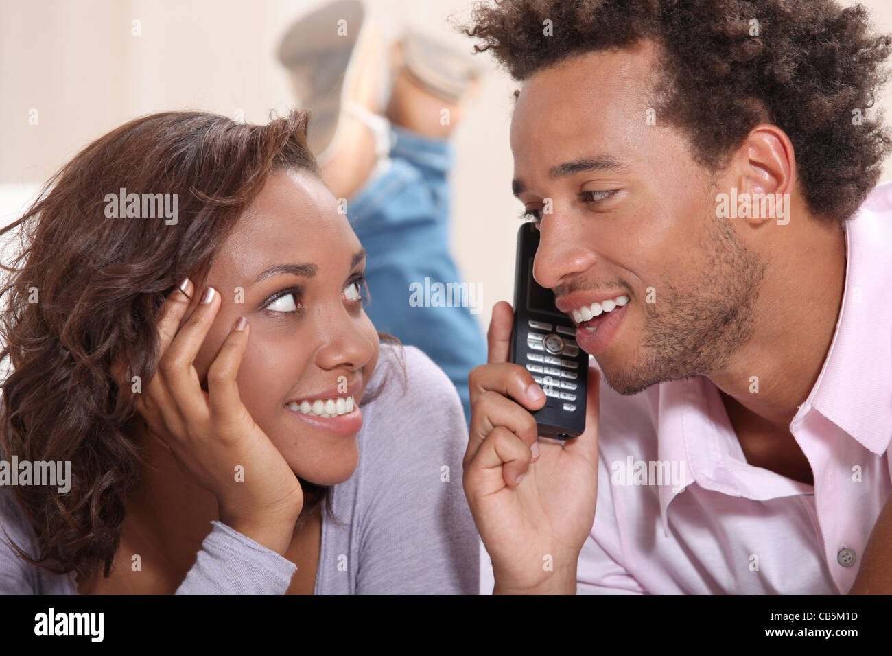 Couple on the phone Stock Photo - Alamy
