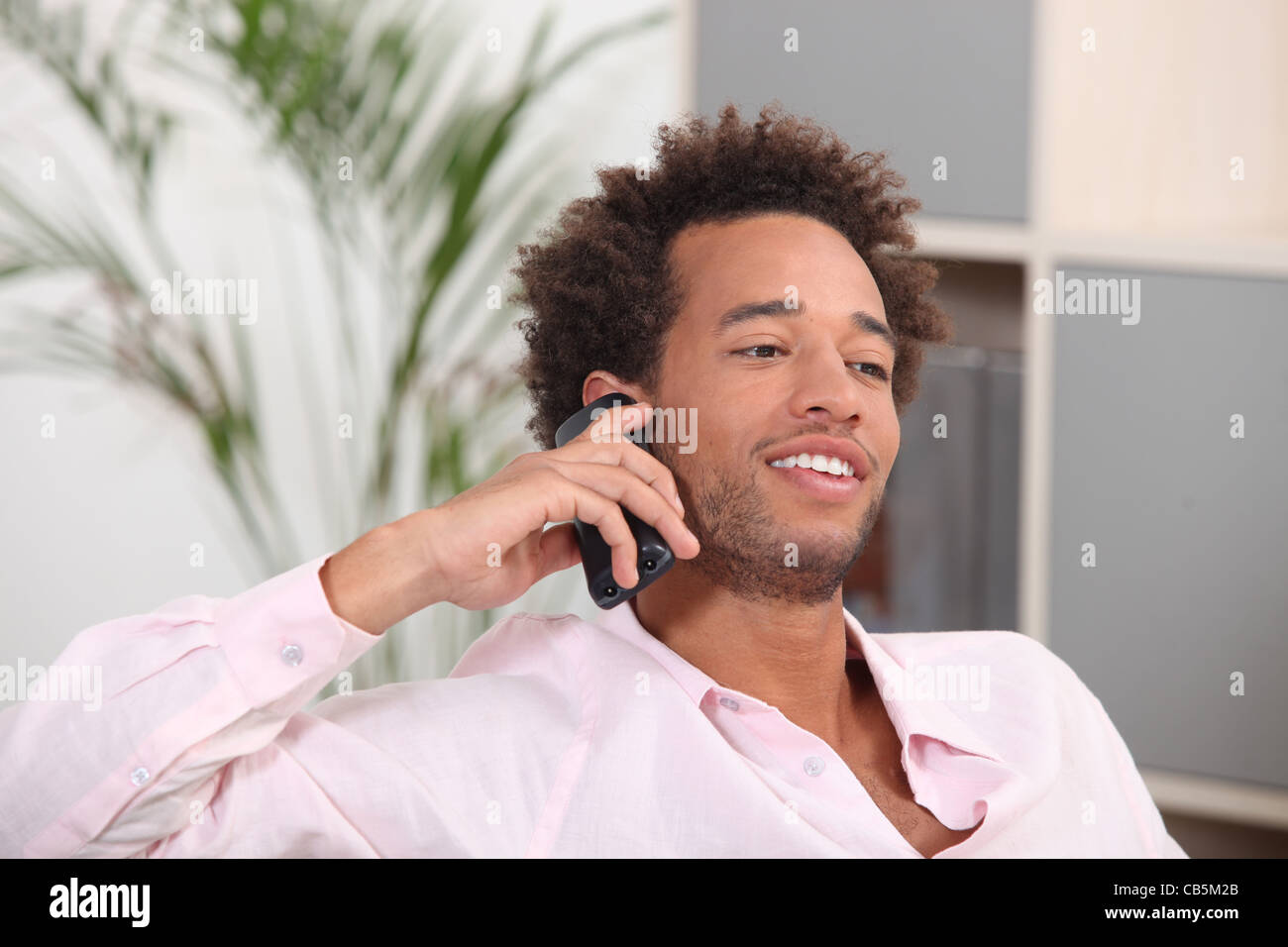 Man talking on his mobile phone Stock Photo - Alamy