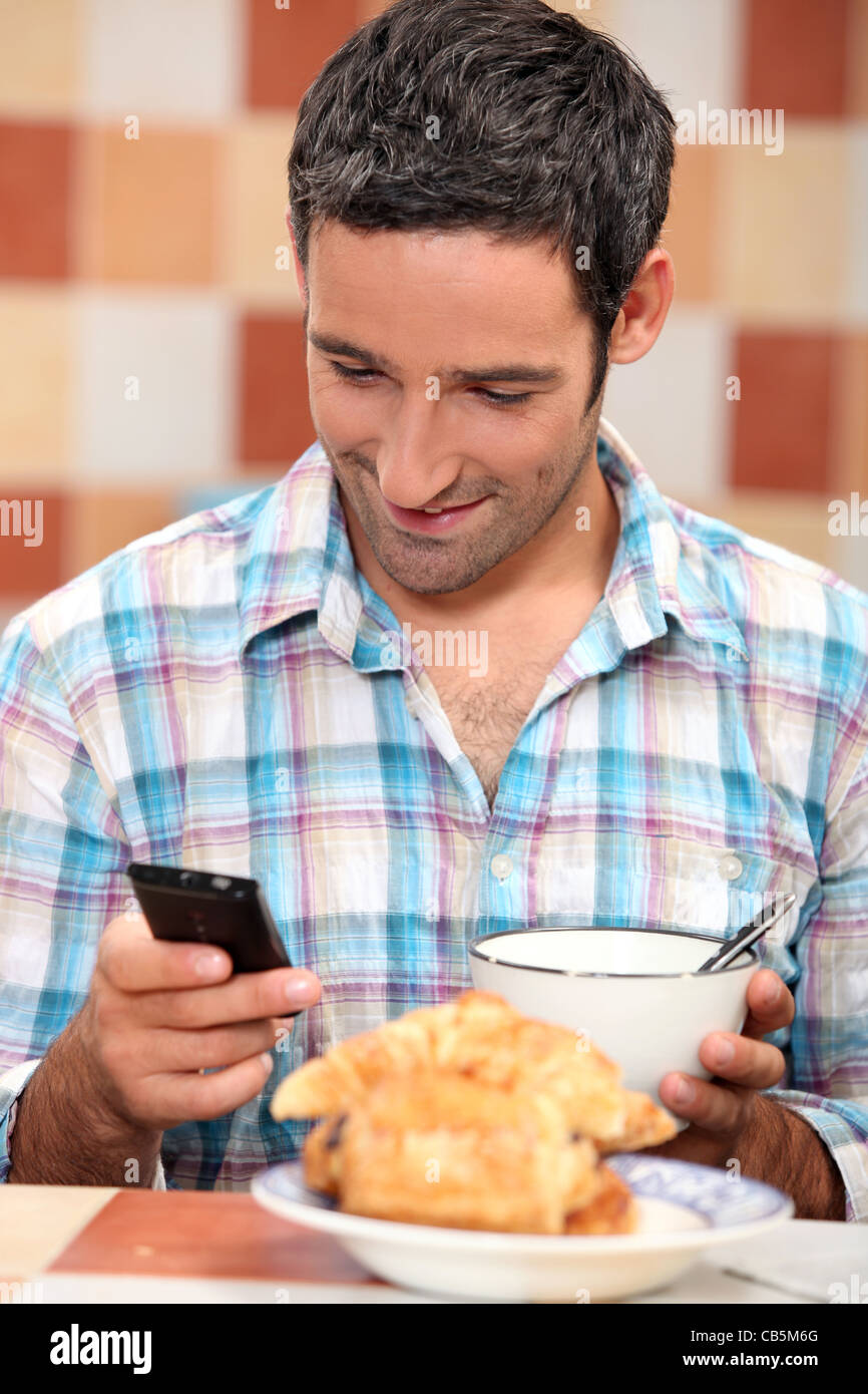 Man having breakfast Stock Photo - Alamy