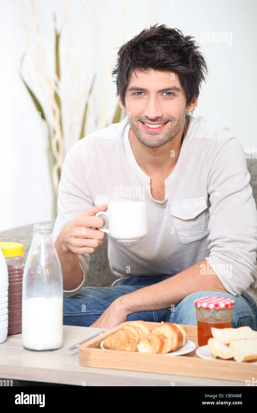 Man having breakfast Stock Photo - Alamy