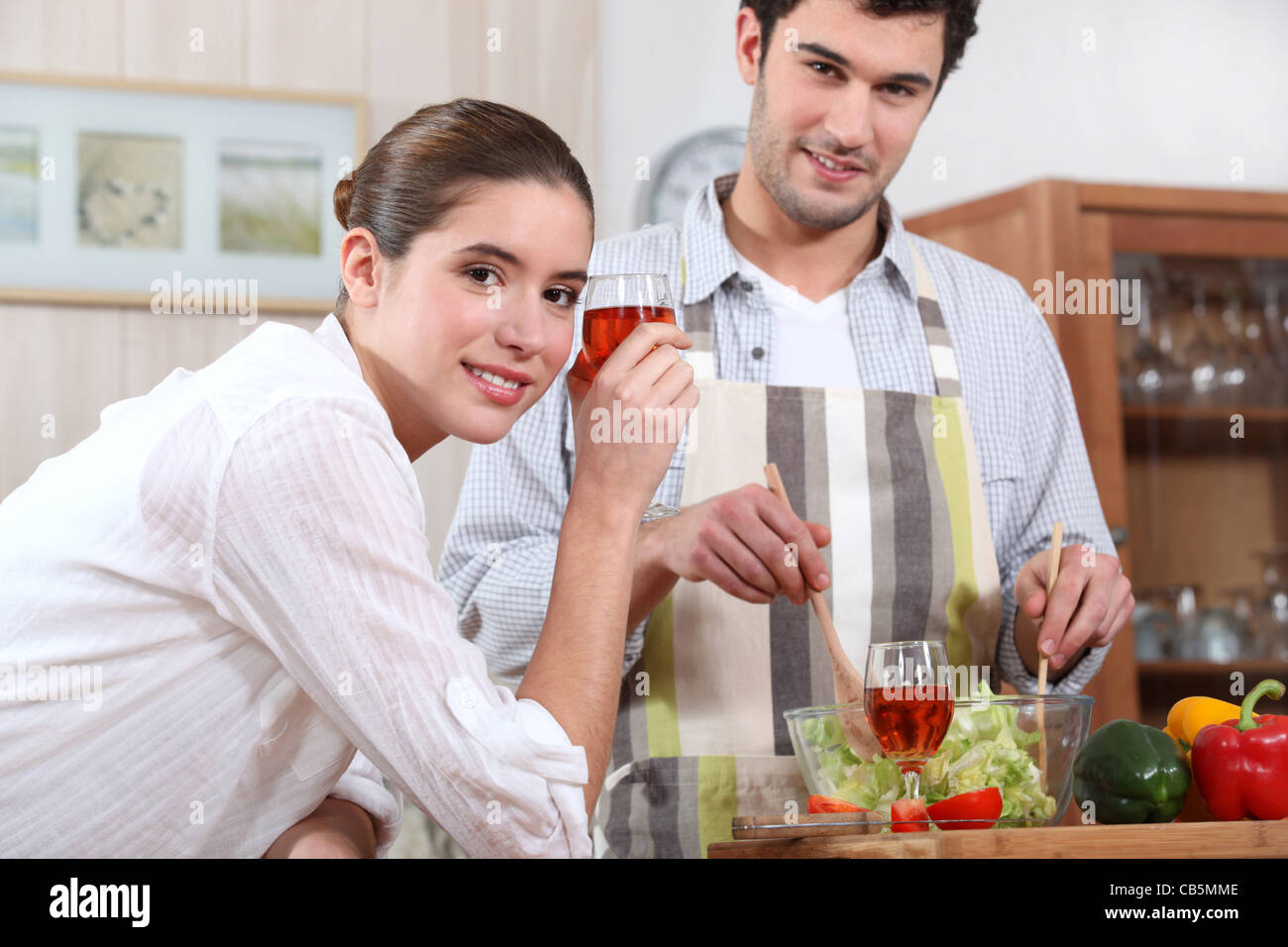 couple making a dinner Stock Photo - Alamy