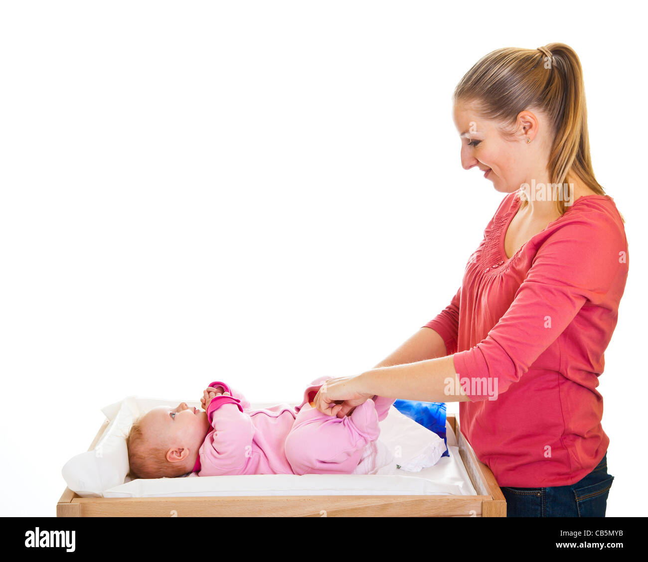 Mother changing childs diaper hi-res stock photography and images - Alamy
