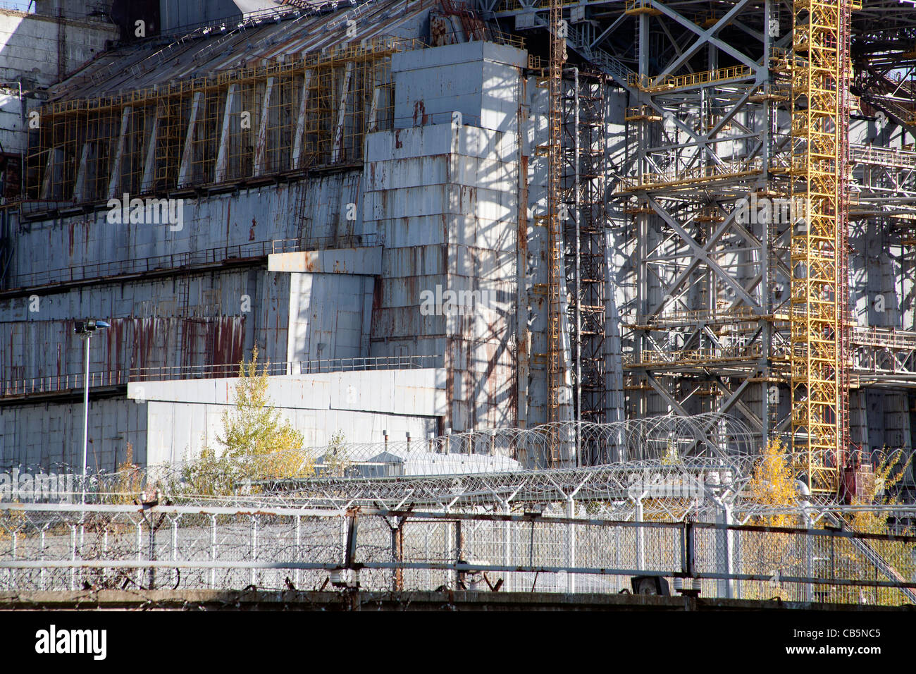 Reactor Number 4 at Chernobyl, encased in its old sarcophagus with the ...