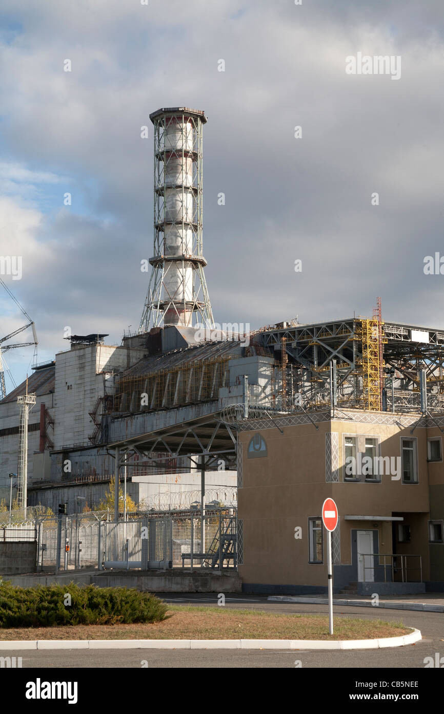 Reactor Number 4 at Chernobyl, encased in its old sarcophagus with the ...