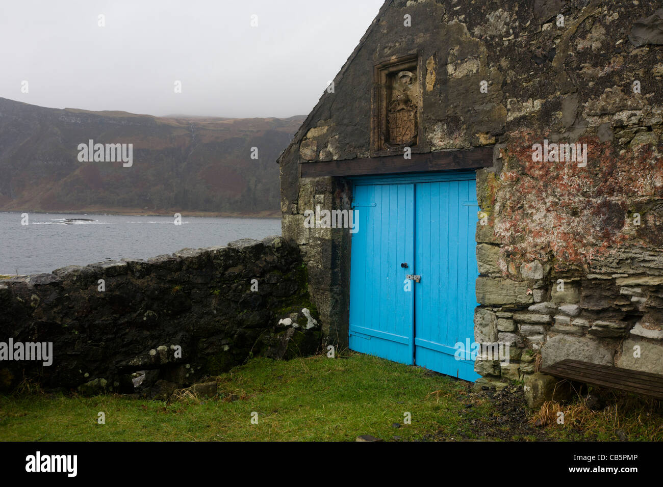 Old pier cottage at Carsaig Bay fishing pier, Isle of Mull, Scotland ...