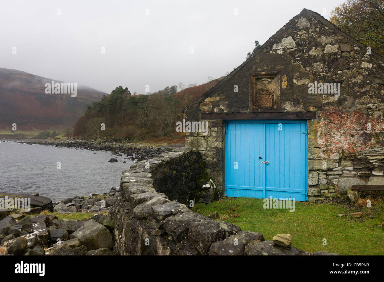 Old pier cottage at Carsaig Bay fishing pier, Isle of Mull, Scotland ...