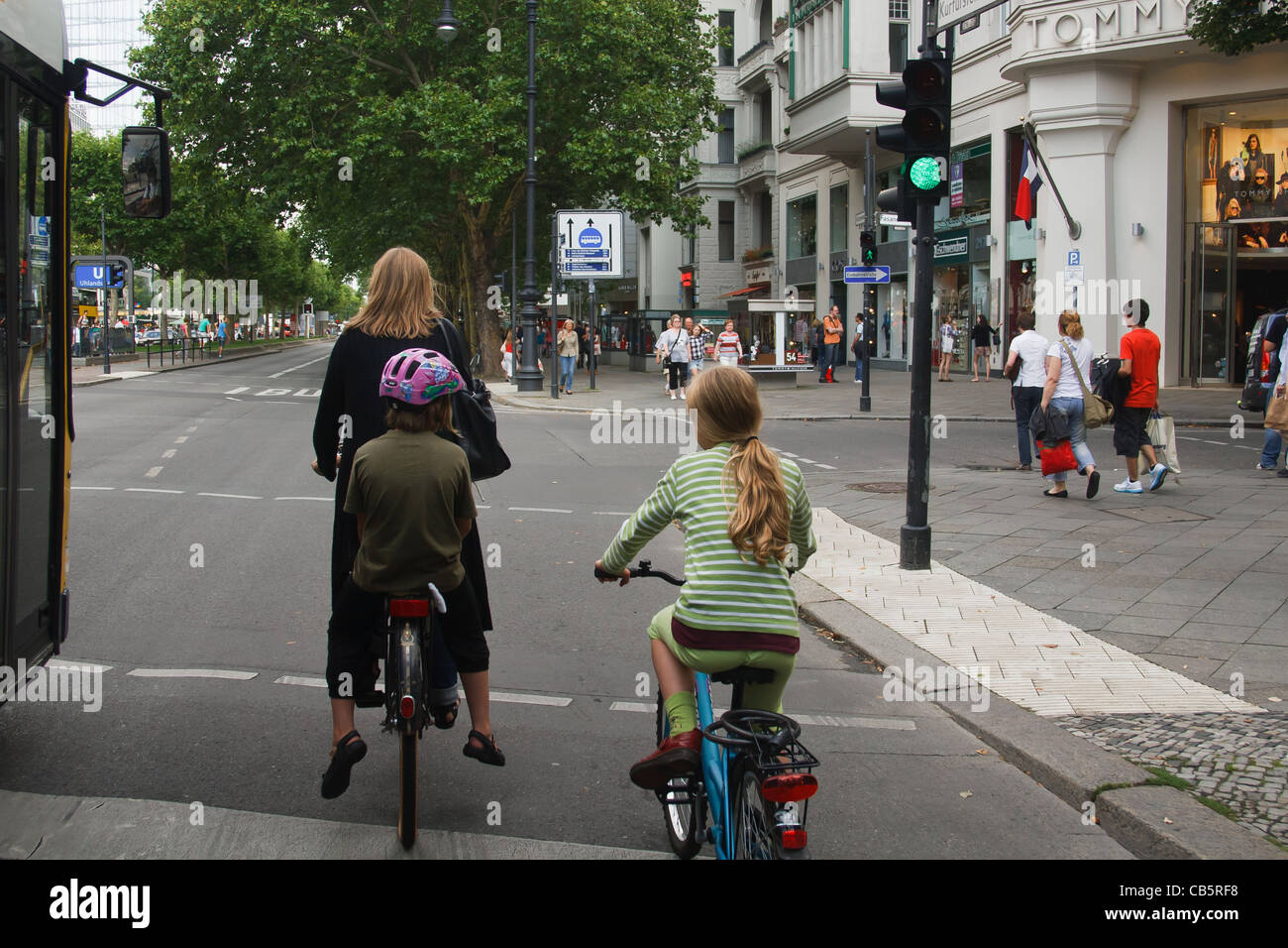 Woman driving bike street germany hi-res stock photography and images ...