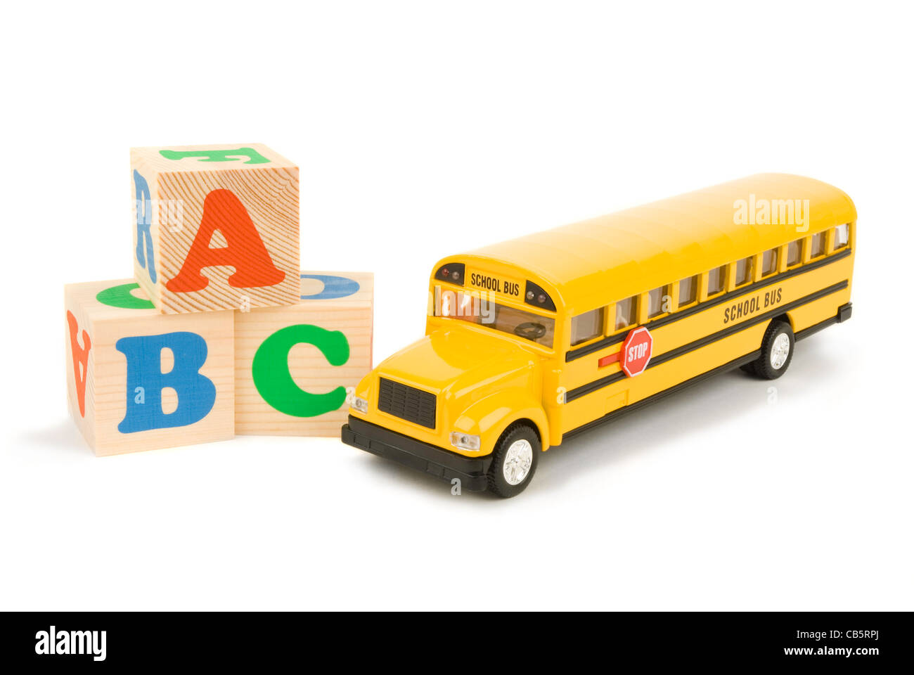 school bus and bricks isolated on white background Stock Photo - Alamy