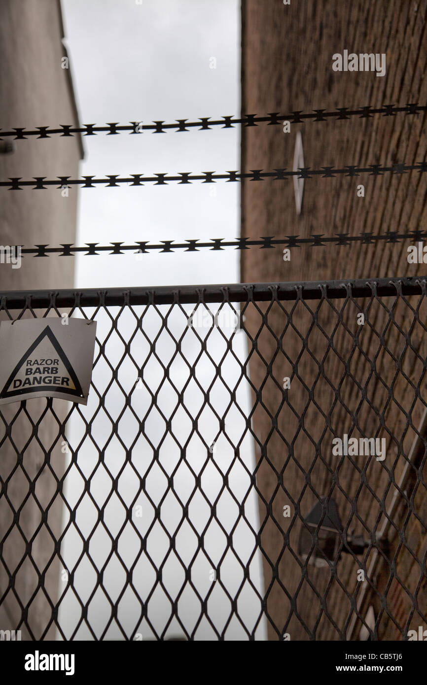 Barb Wire Over gate Stock Photo - Alamy