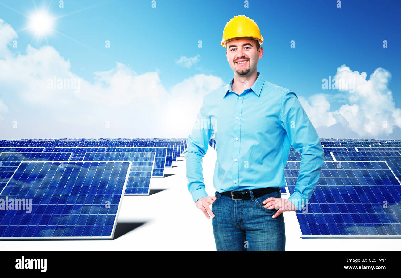 confident engineer and solar panel background Stock Photo - Alamy