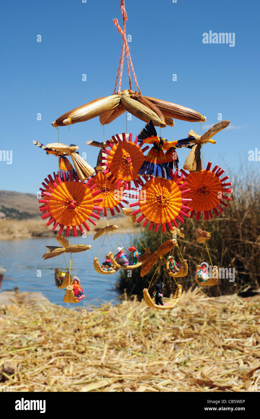 Hand made reed toys on the floating islands of Uros in Lake Titicaca ...