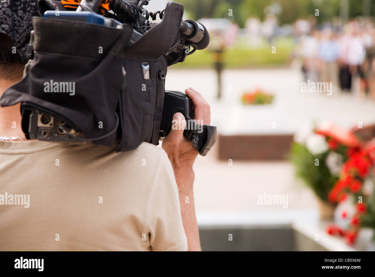 news cameraman, selective focus point on hand Stock Photo - Alamy