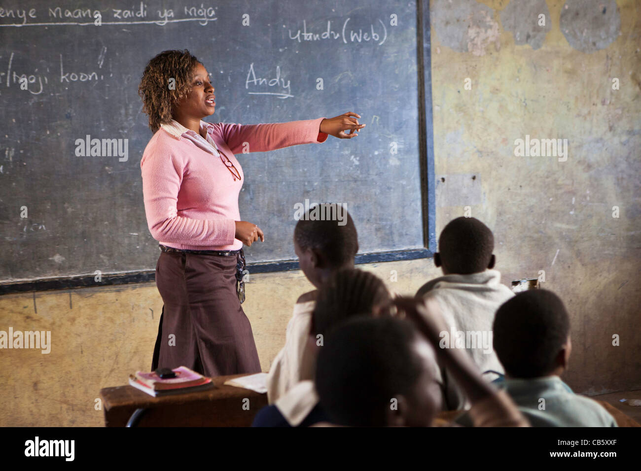Teacher and class in classroom at Mathare School in Nairobi, Kenya. NGO ...